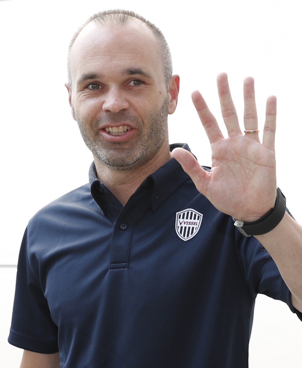 Football: Andres Iniesta makes stylish arrival in Japan